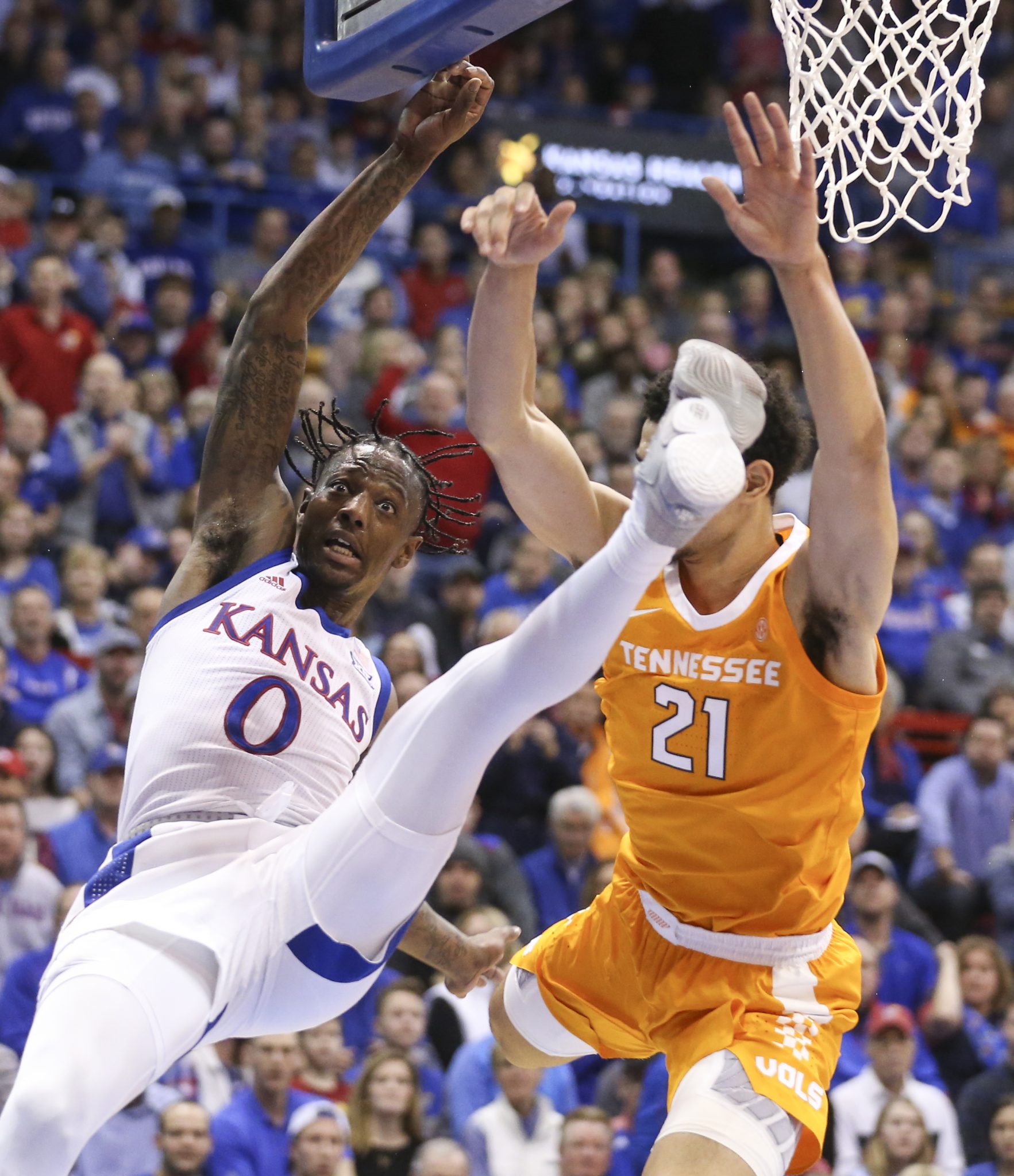 Notebook: KU junior Marcus Garrett fine after hard fall in win over UT ...